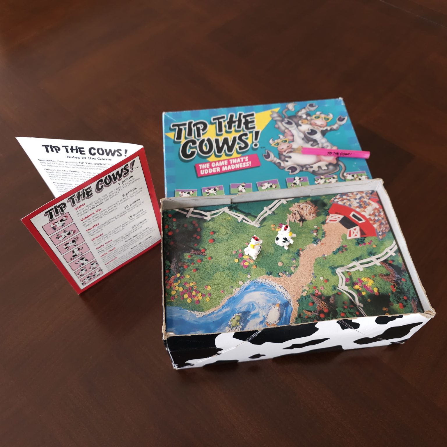 Game Review: Tip the Cows vs. Pass the Pigs – WIZARD TAG